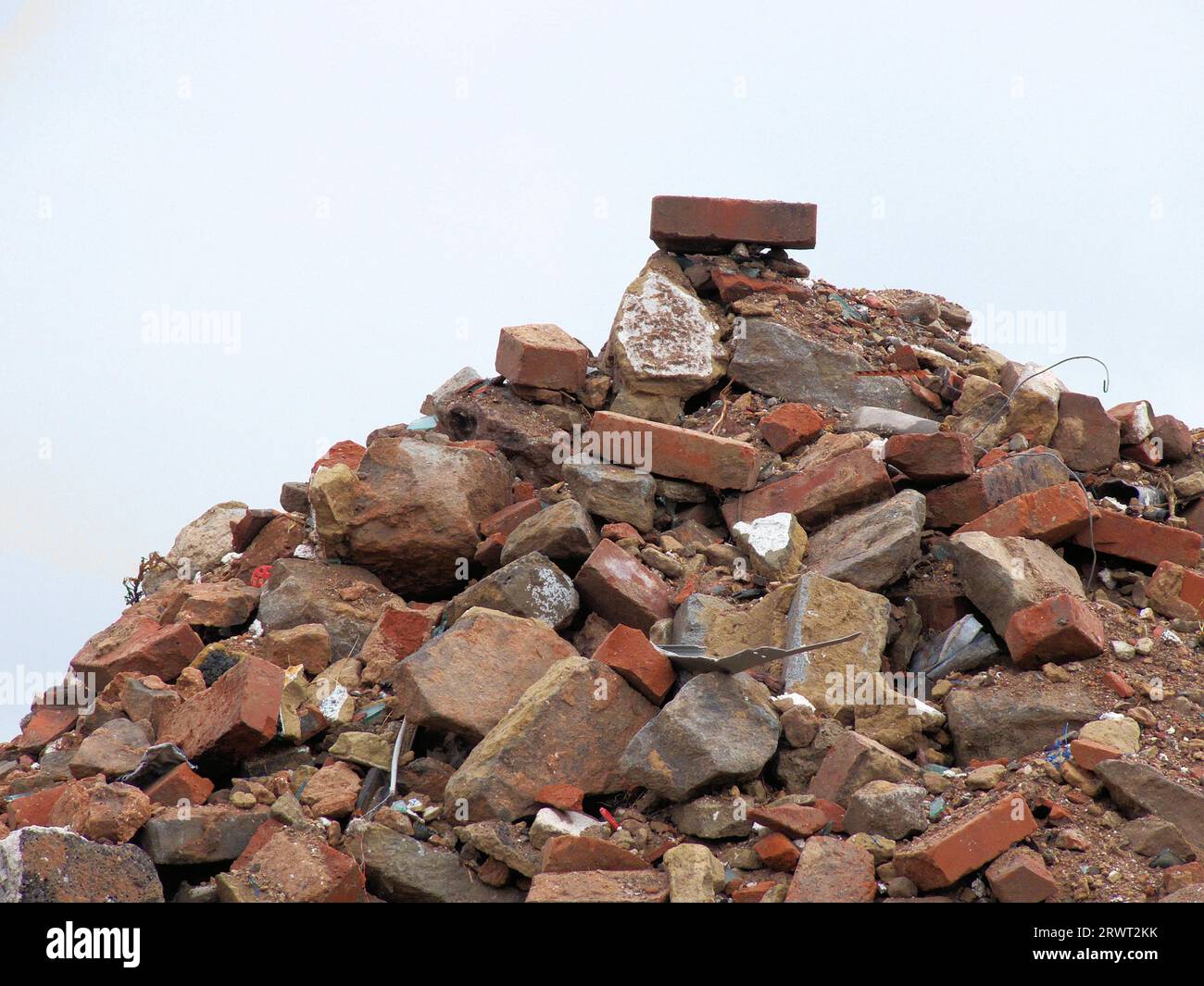 Large pile of rubble, mainly bricks and rubble, after demolition of ...