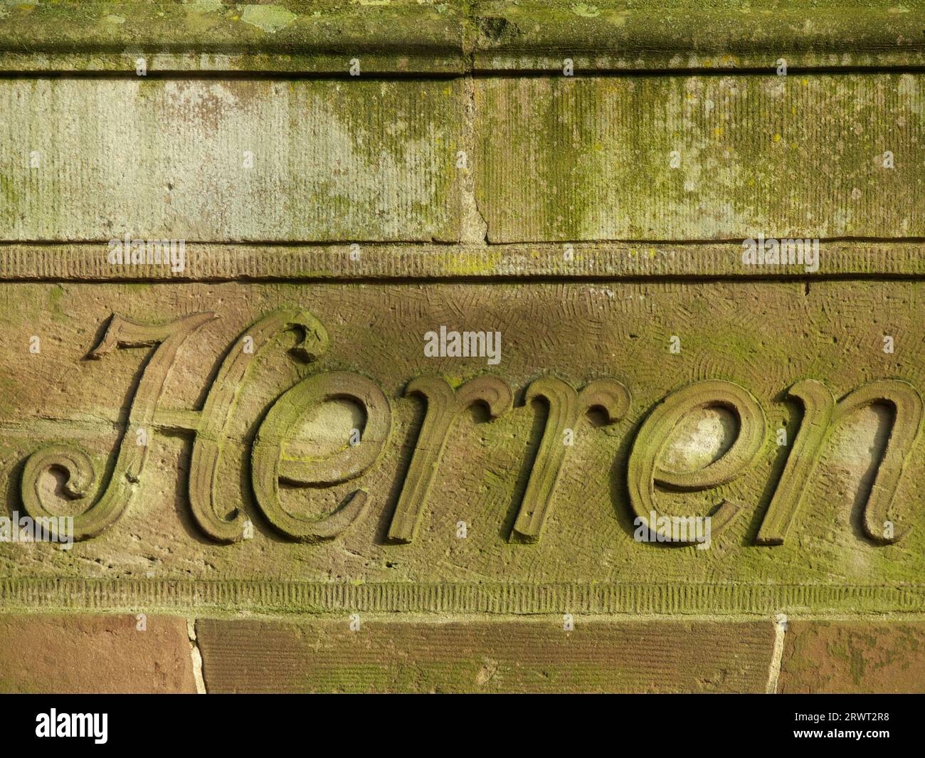 Ancient chiselled characters Stock Photo - Alamy