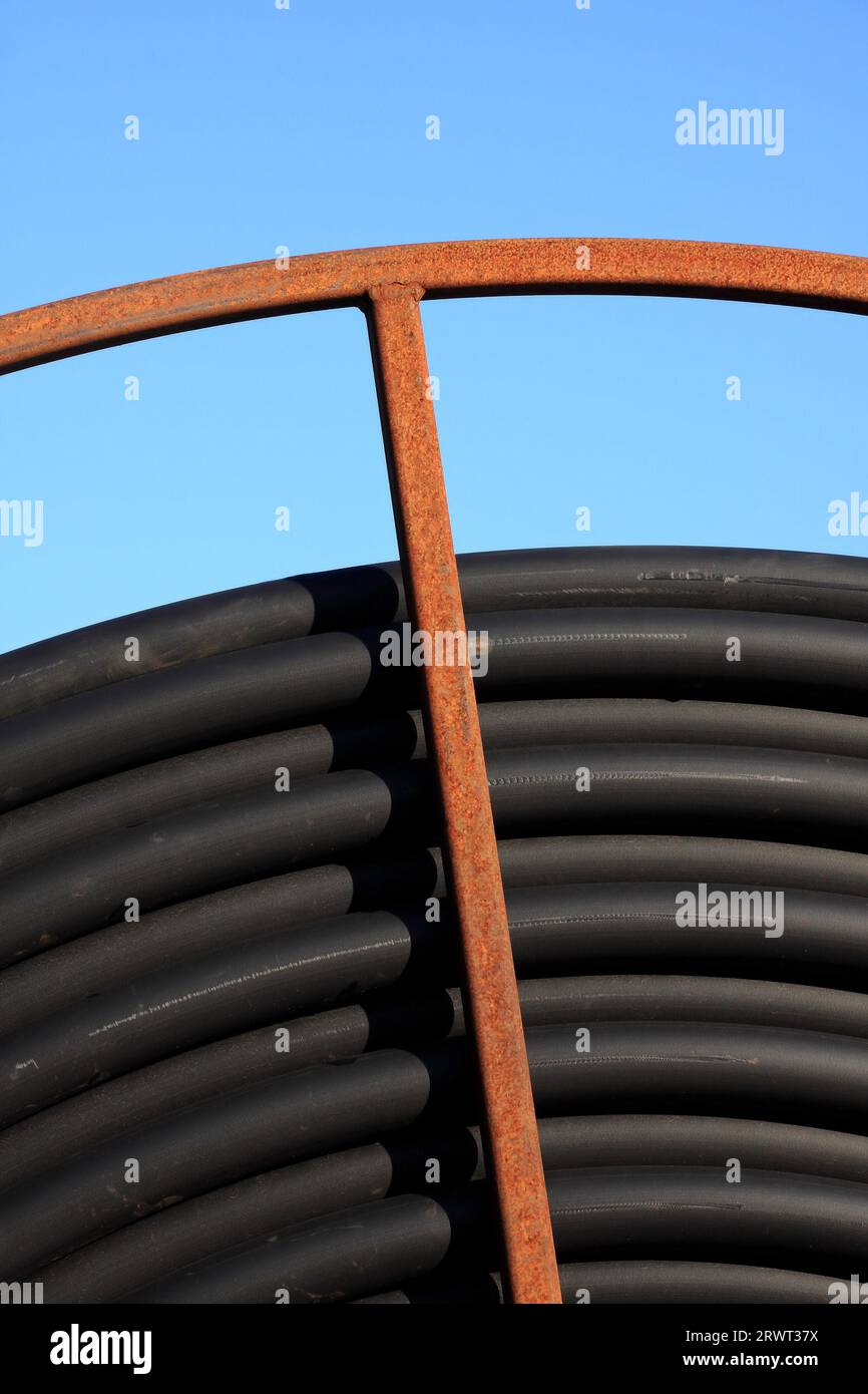 Cable reel with black cable, cut-out, background blue sky Stock Photo ...