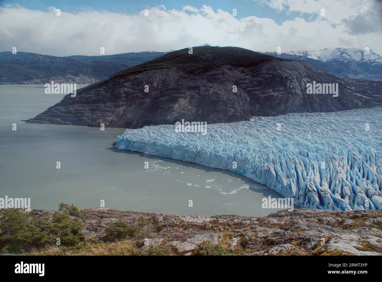 Wrinkled ice wedged between two mountains in Torres del Paine National ...