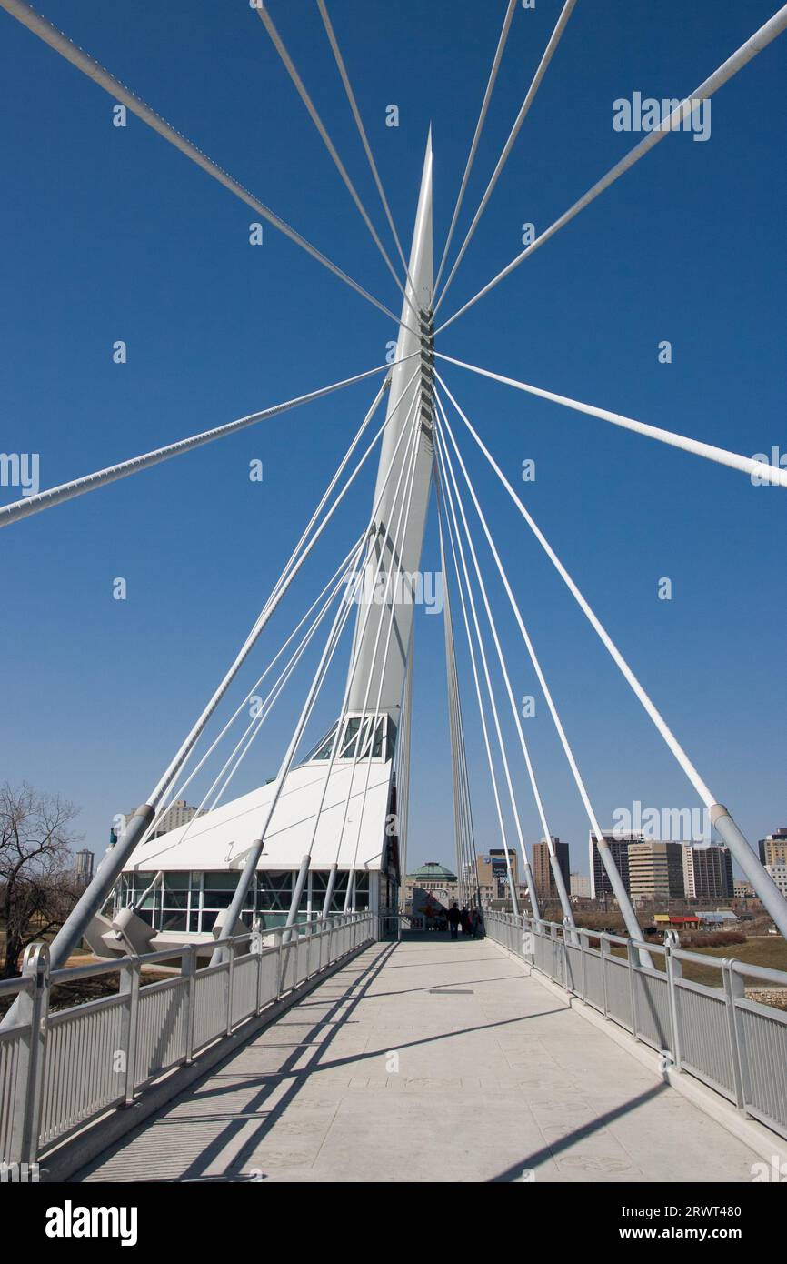 Esplanade Riel pedestrian bridge across the Red River in Winnipeg ...