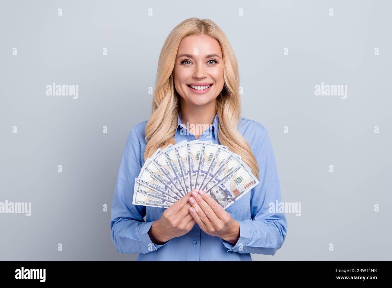 Photo of gorgeous cheerful person toothy smile hands hold showing ...