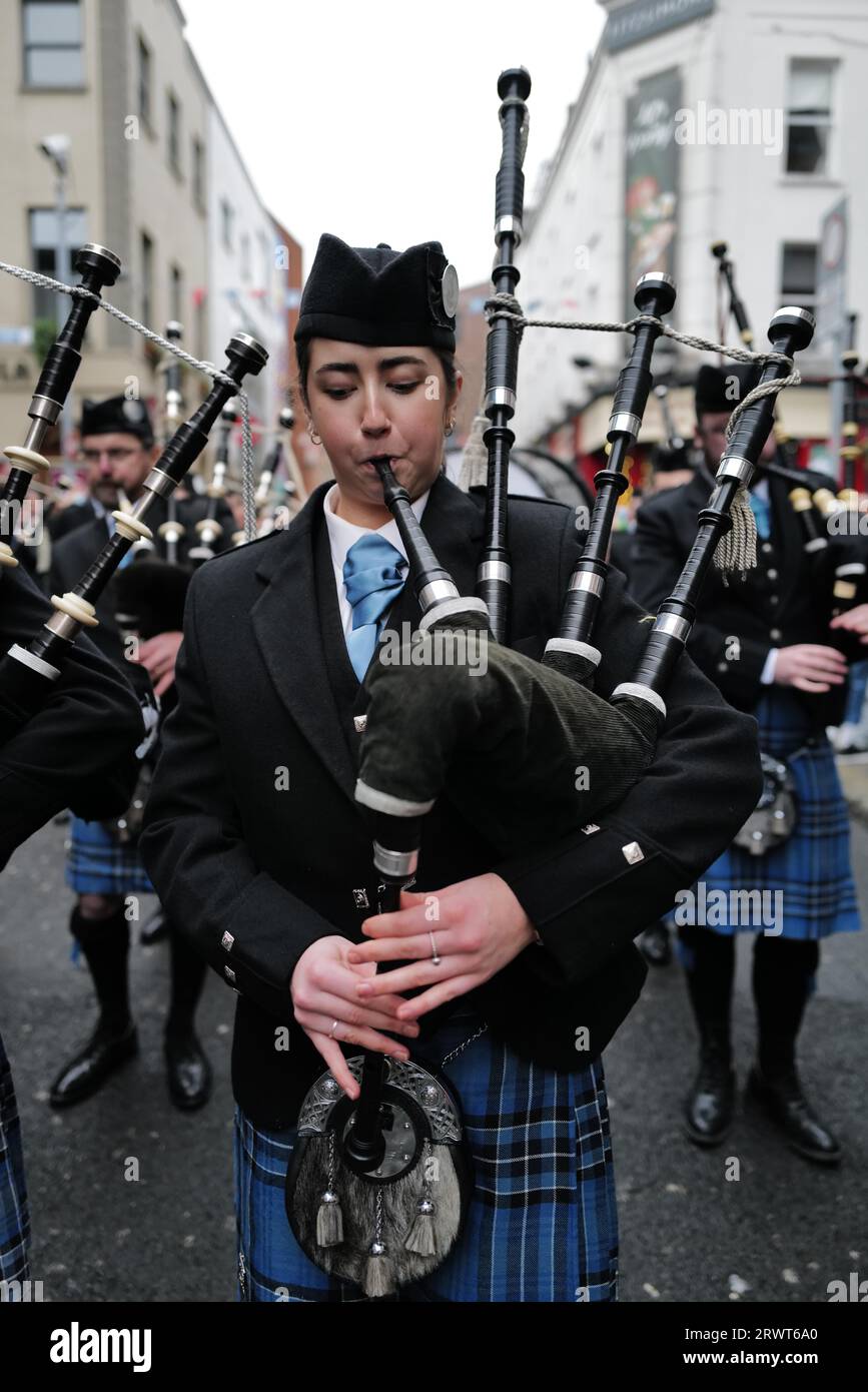 An Irish piper plays a tune in Temple Bar at the start of Trad Fest, a ...