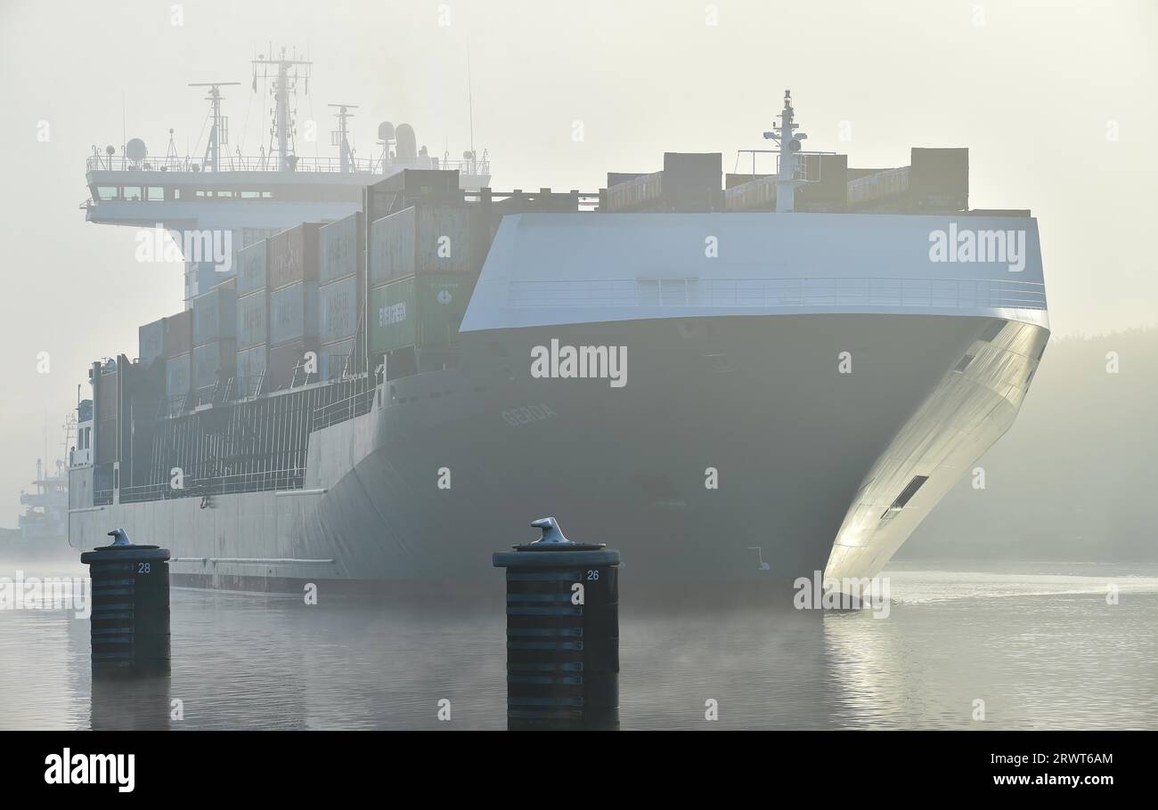Container ship in fog in the Kiel Canal, Schleswig-Holstein, Germany ...
