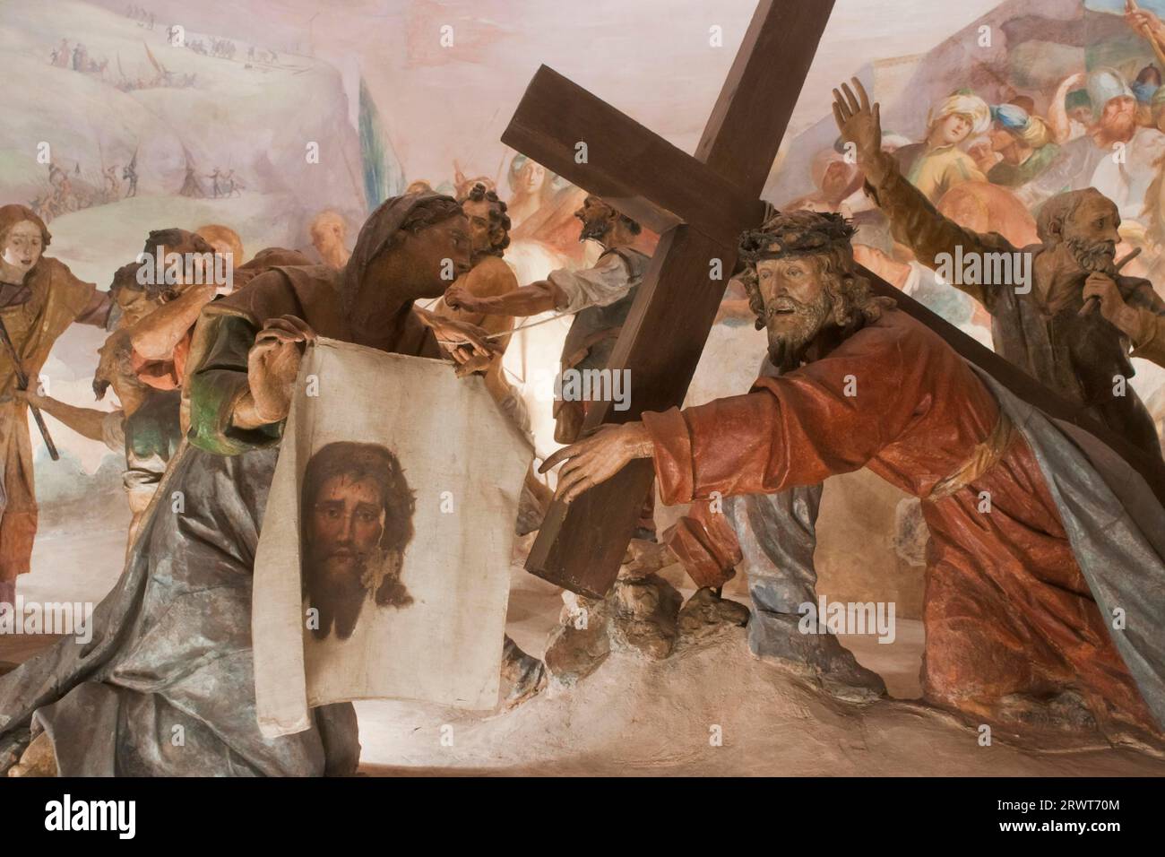 Jesus breaks under the cross together and Veronica wipes his face with ...