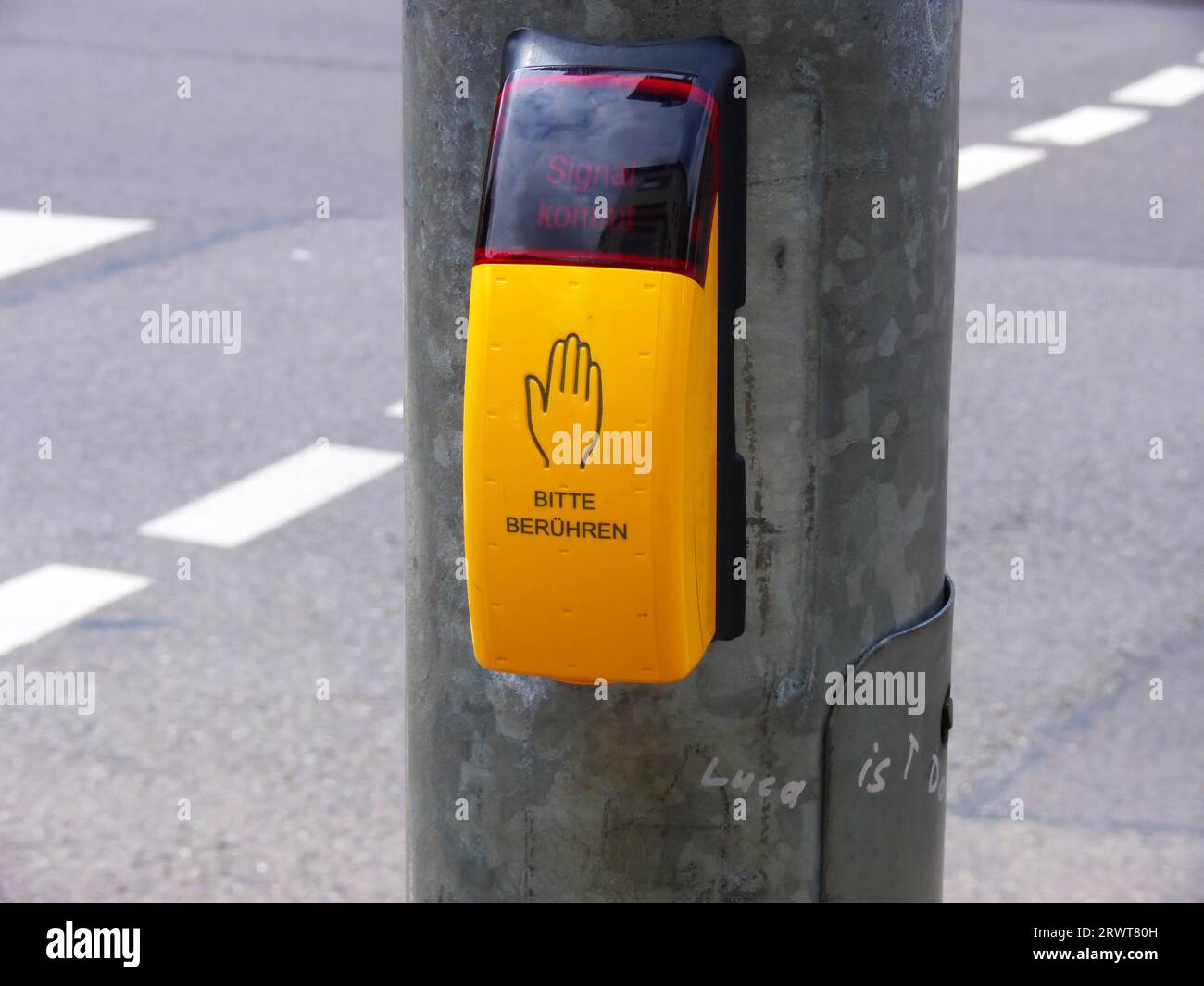 Pedestrian traffic light, button to press to switch pedestrian traffic ...