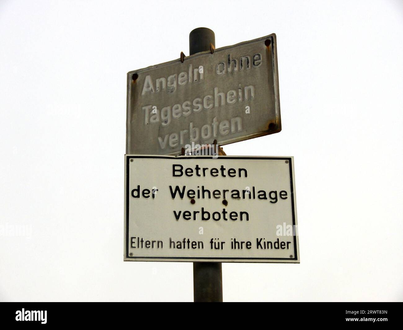 Two prohibition signs placed one above the other Stock Photo - Alamy