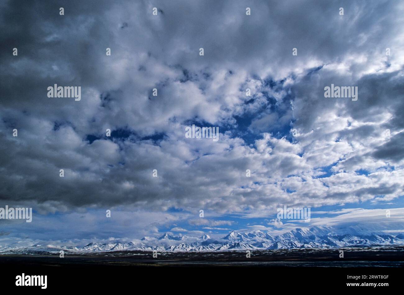 Mountain peaks of the Alaska Range and clouds, Denali National Park ...