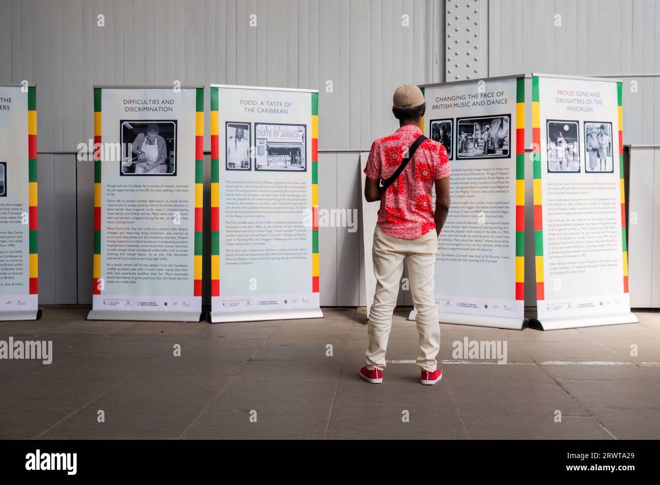 People viewing a Windrush Day exhibition / display at Tilbury Cruise ...