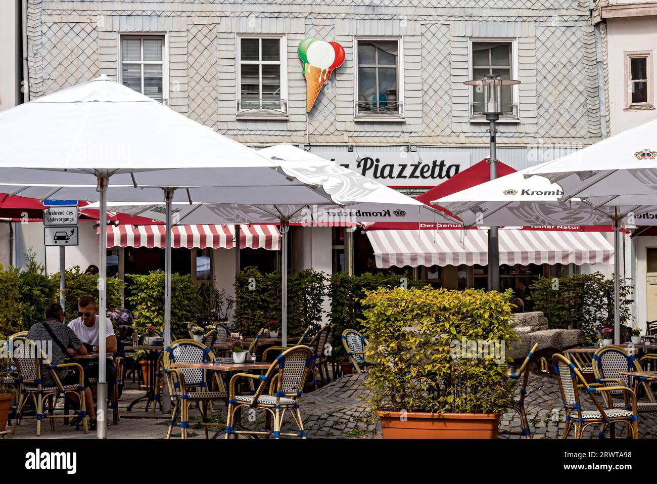 Historic town house clad in shingles, ice cream cone, parasols ...