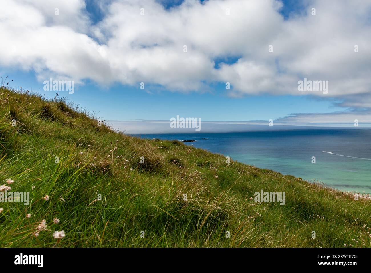 A hillside view over the ocean, at Sennen on the Cornish coast Stock ...
