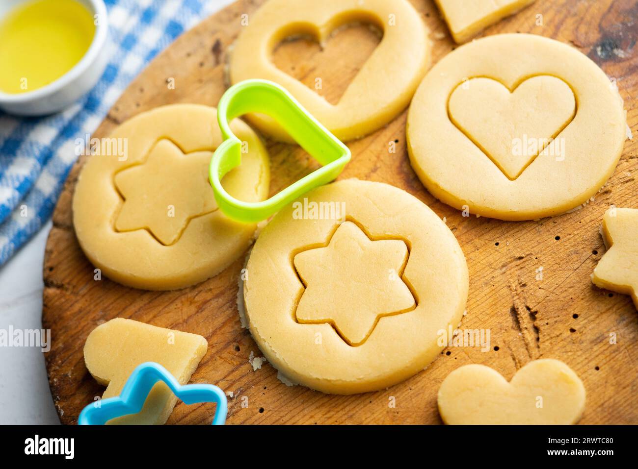 Preparing butter cookies for children with star and heart shapes Stock ...