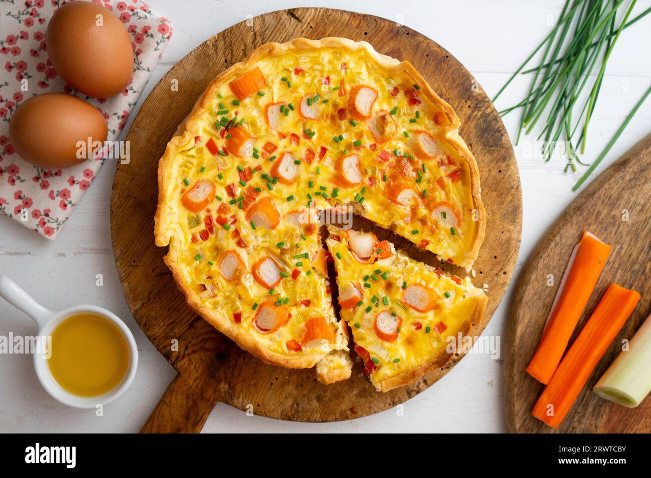 French style quiche with egg and crab surimi Stock Photo - Alamy
