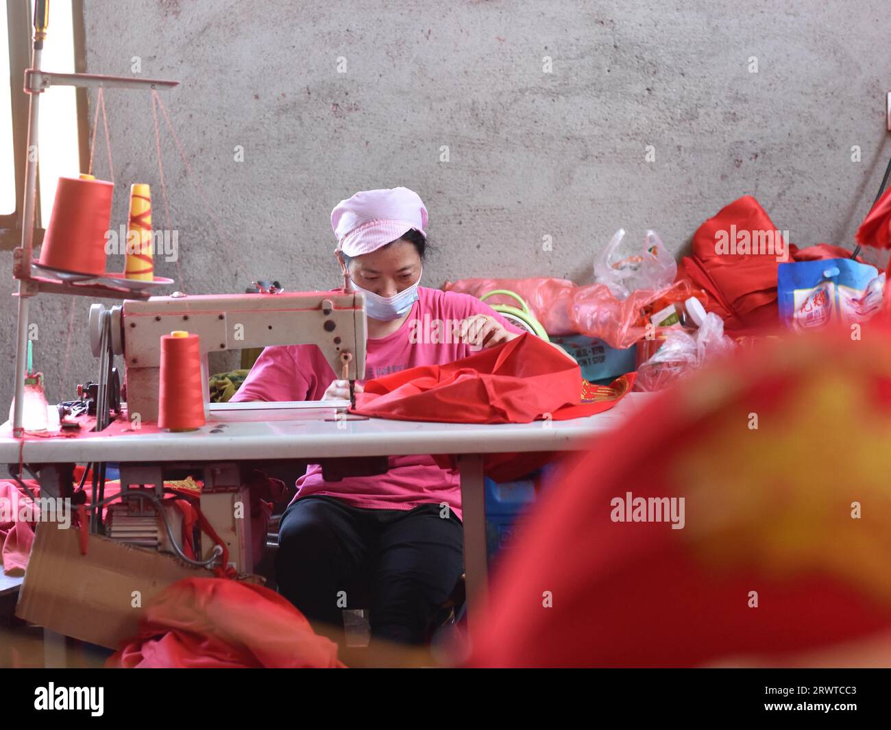 Workers make red lanterns for the upcoming Mid-Autumn Festival and ...