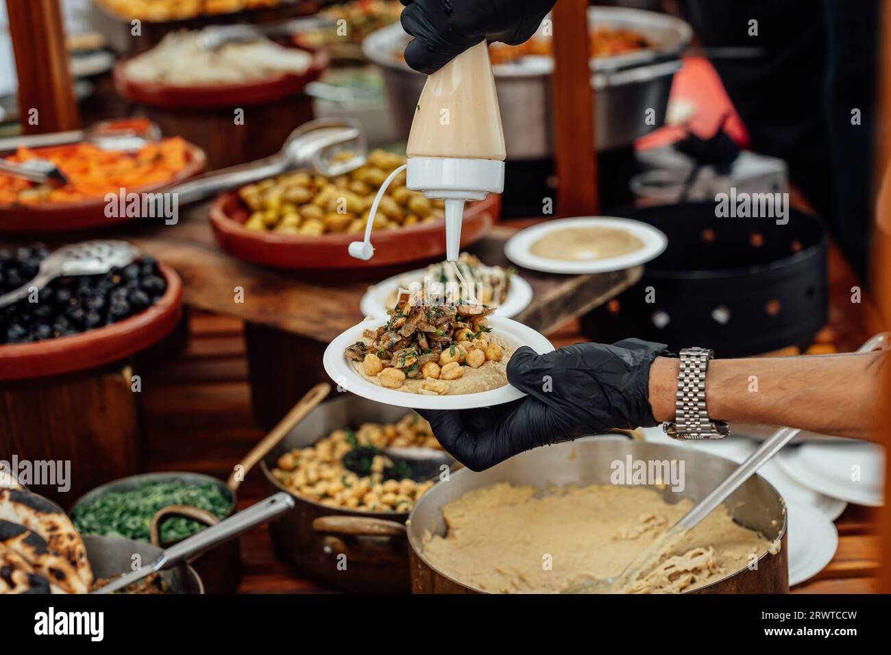 Variety if Israeli food served with salad pita bread and appetizers ...