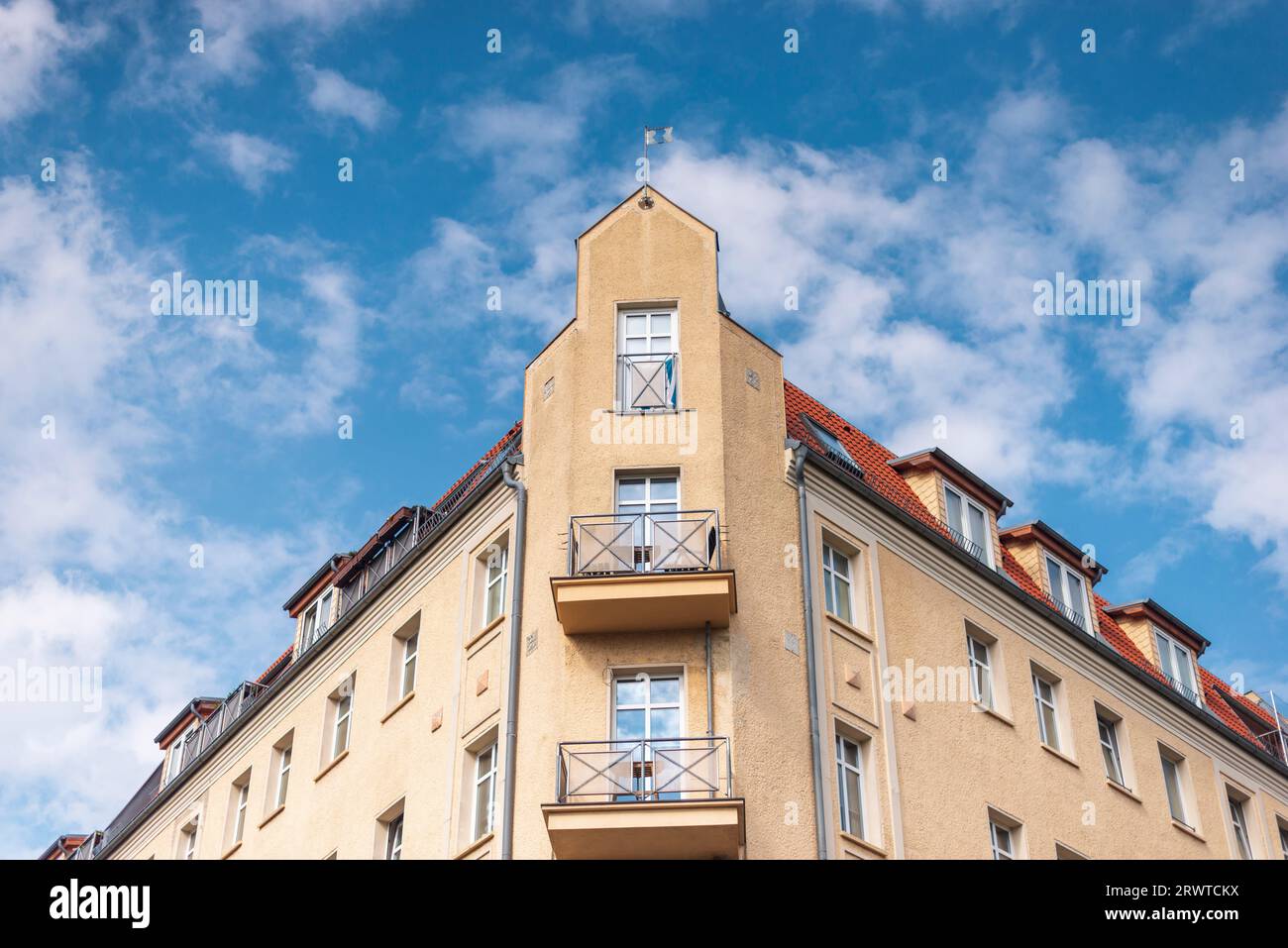 low angle view to city building corner by bright sunny day Stock Photo ...