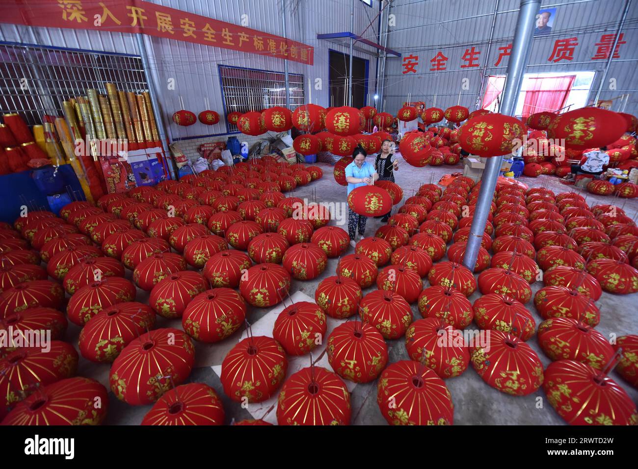 Workers make red lanterns for the upcoming Mid-Autumn Festival and ...