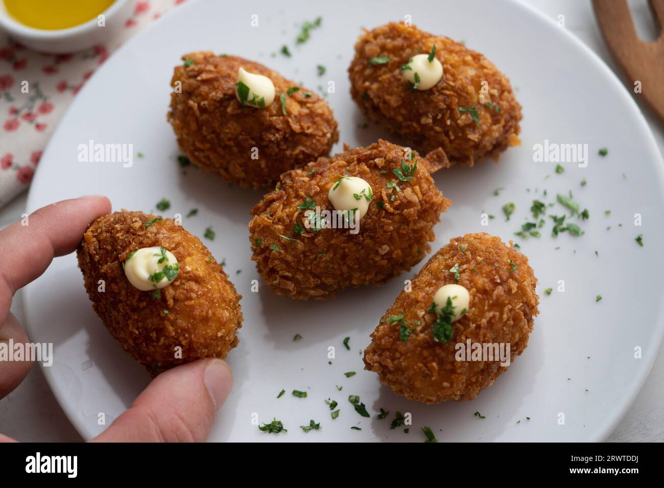 Panko-battered white fish nuggets served with a little mayonnaise Stock ...