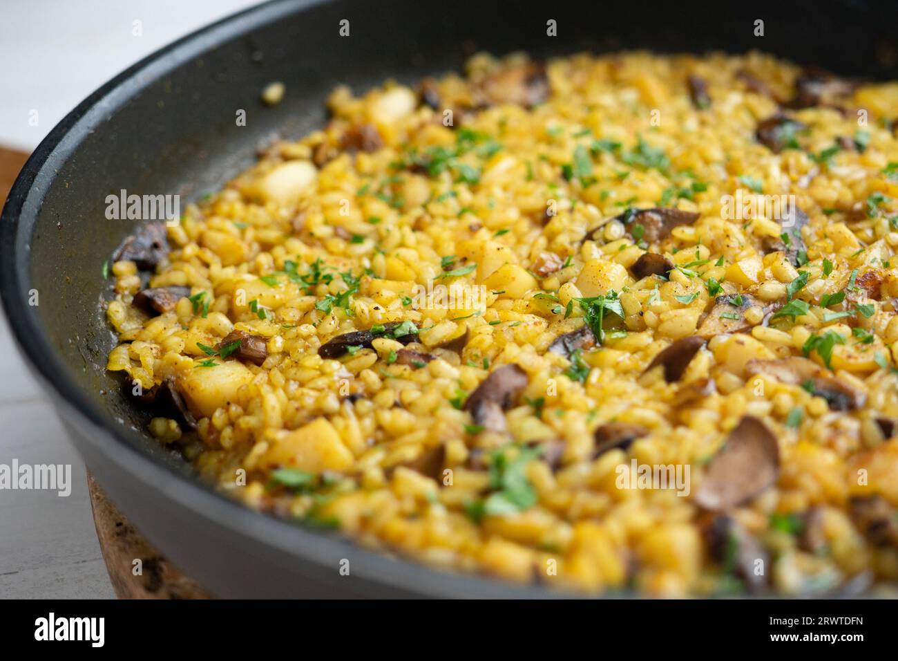 Rice paella with fish and cuttlefish, traditional Spanish recipe Stock ...