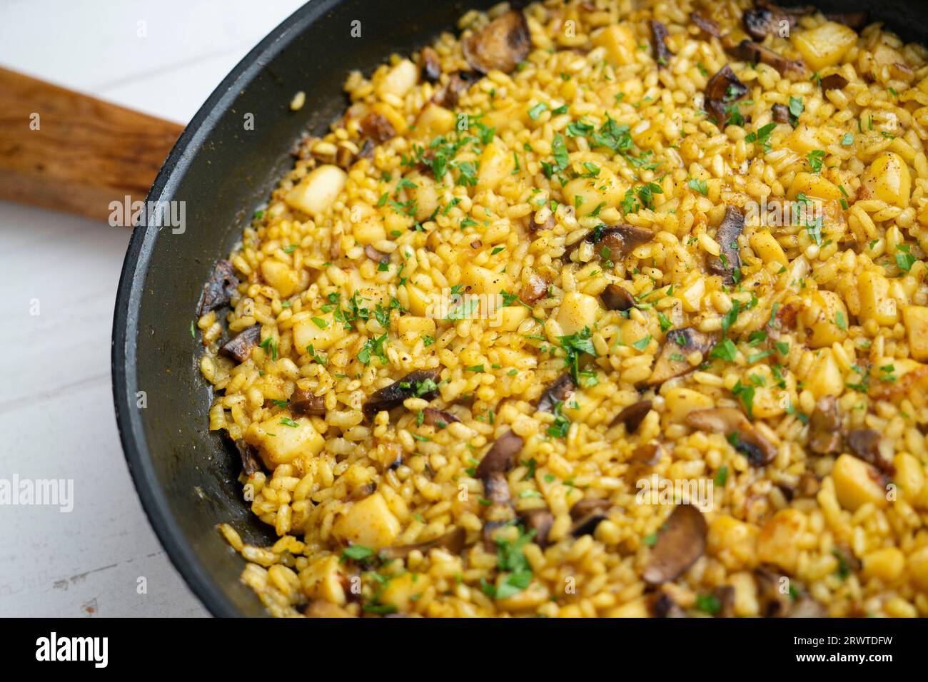 Rice paella with fish and cuttlefish, traditional Spanish recipe Stock ...