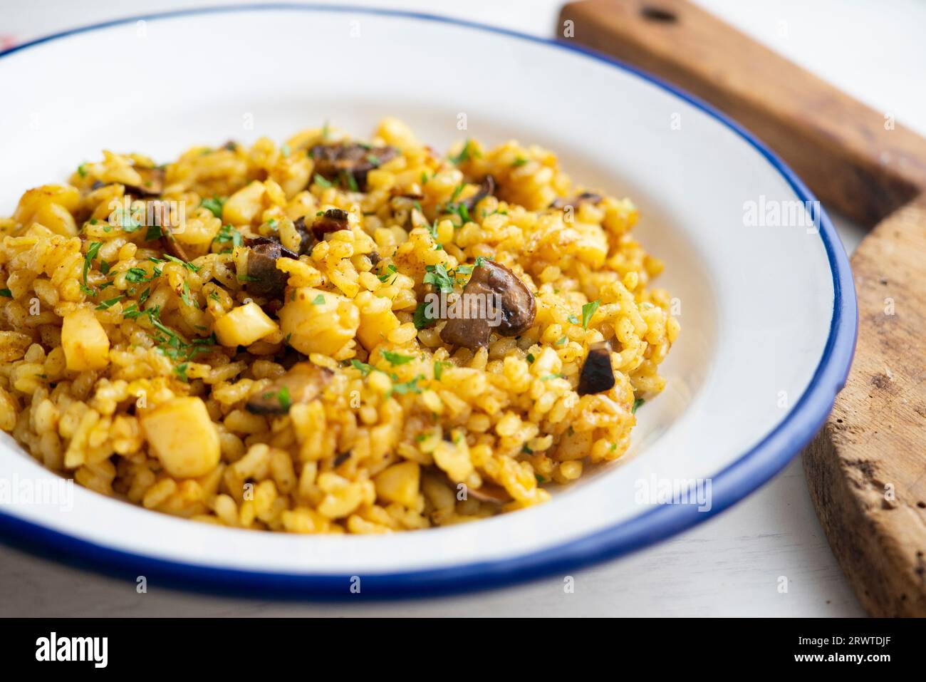 Rice paella with fish and cuttlefish, traditional Spanish recipe Stock ...