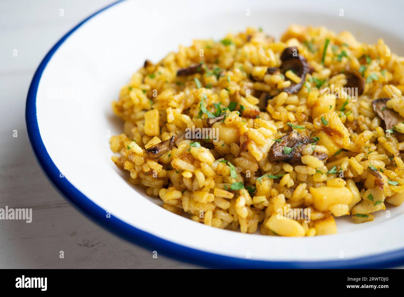 Rice paella with fish and cuttlefish, traditional Spanish recipe Stock ...