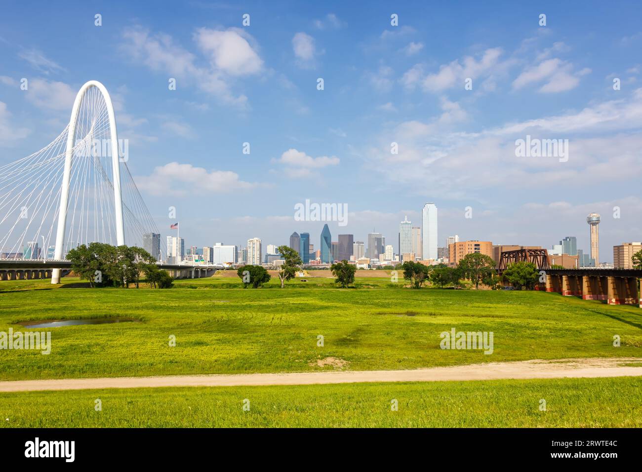 Dallas skyline at Trinity River and Margaret Hunt Hill Bridge traveling ...