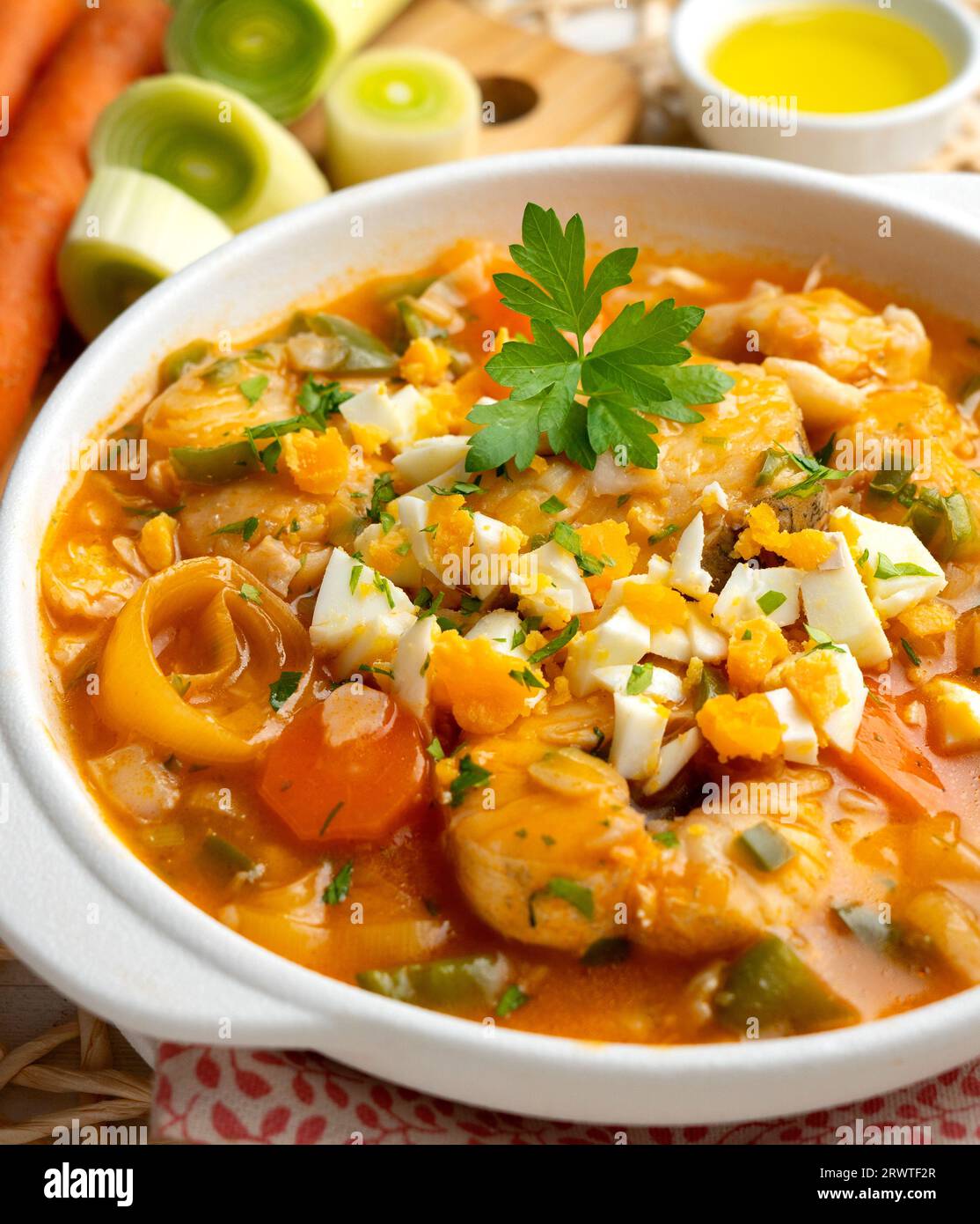 Hake stew with potatoes, leeks and other seasonal vegetables Stock ...