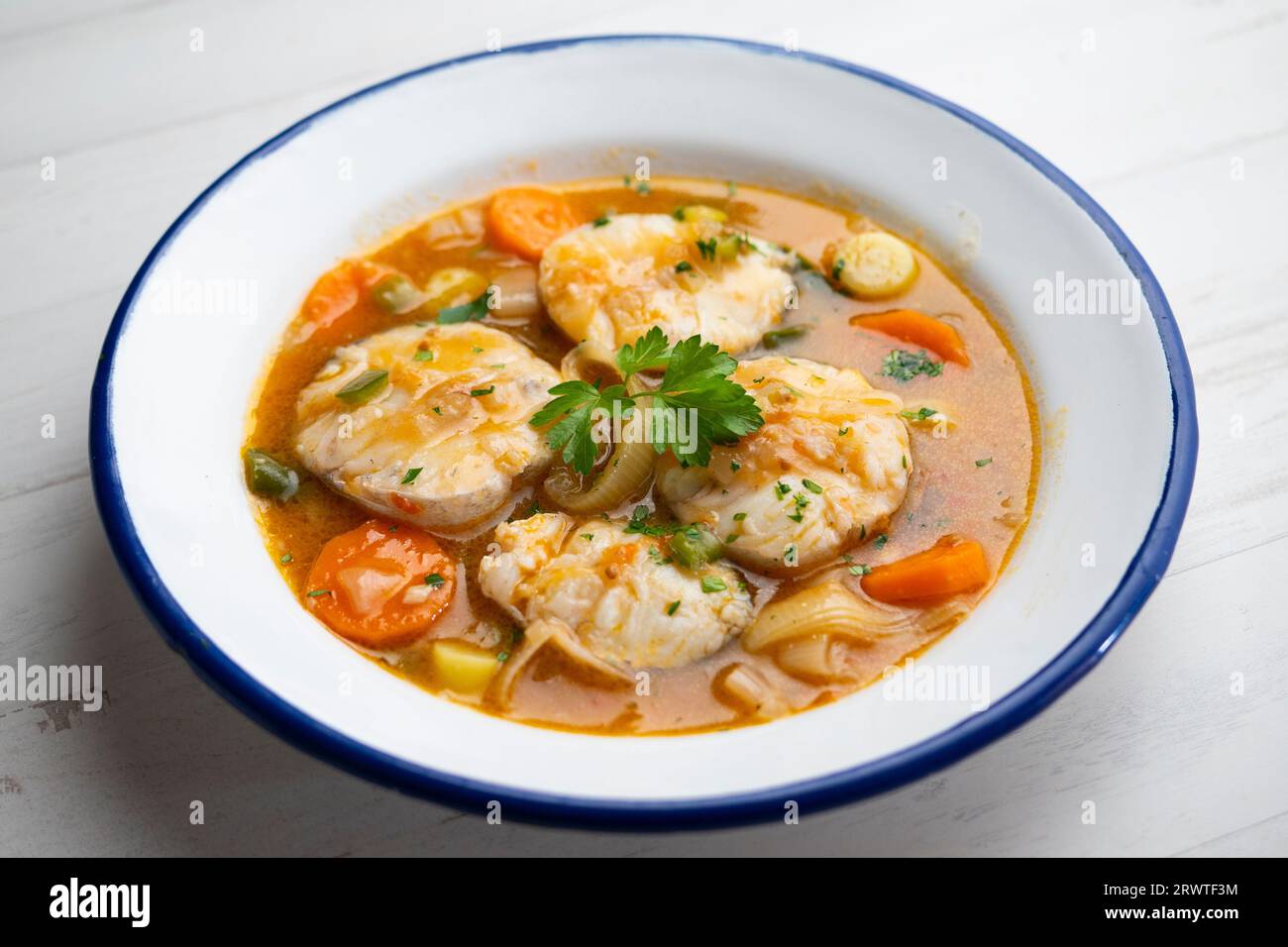 Hake stew with potatoes, leeks and other seasonal vegetables Stock ...