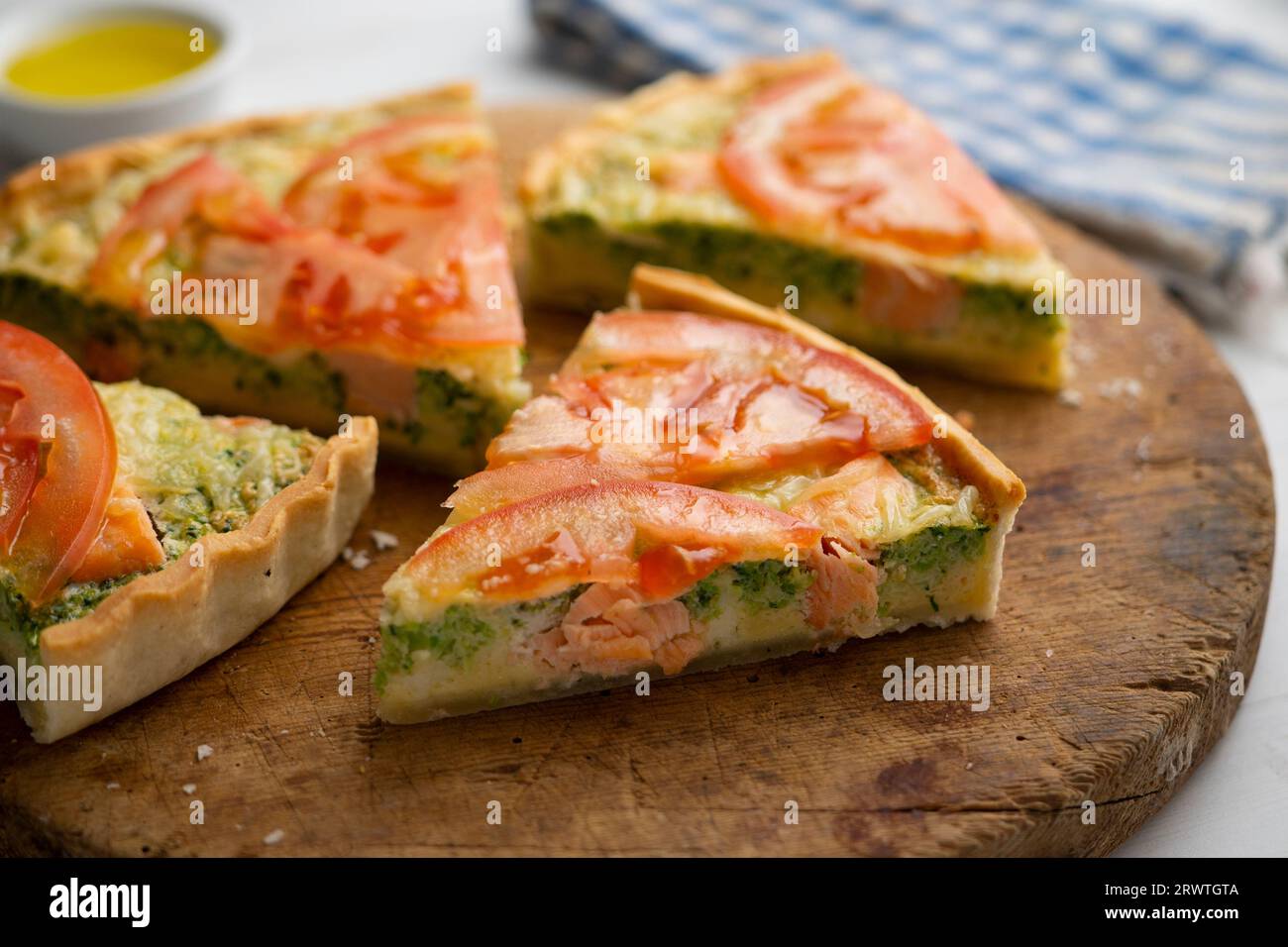 French style quiche with broccoli, salmon, and slices tomato Stock ...