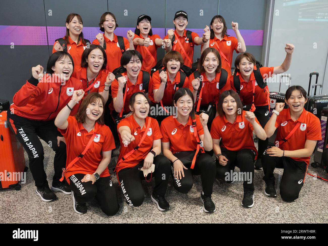 Members of Japan's national handball team pose for a group photo upon ...