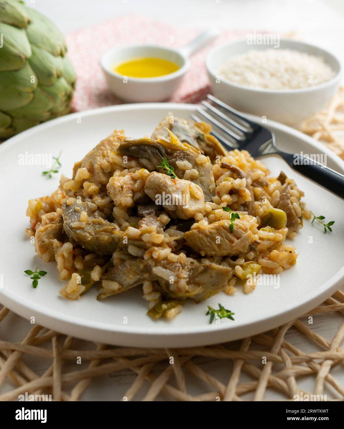 Spanish paella tapa. Traditional recipe cooked with rice and chicken ...