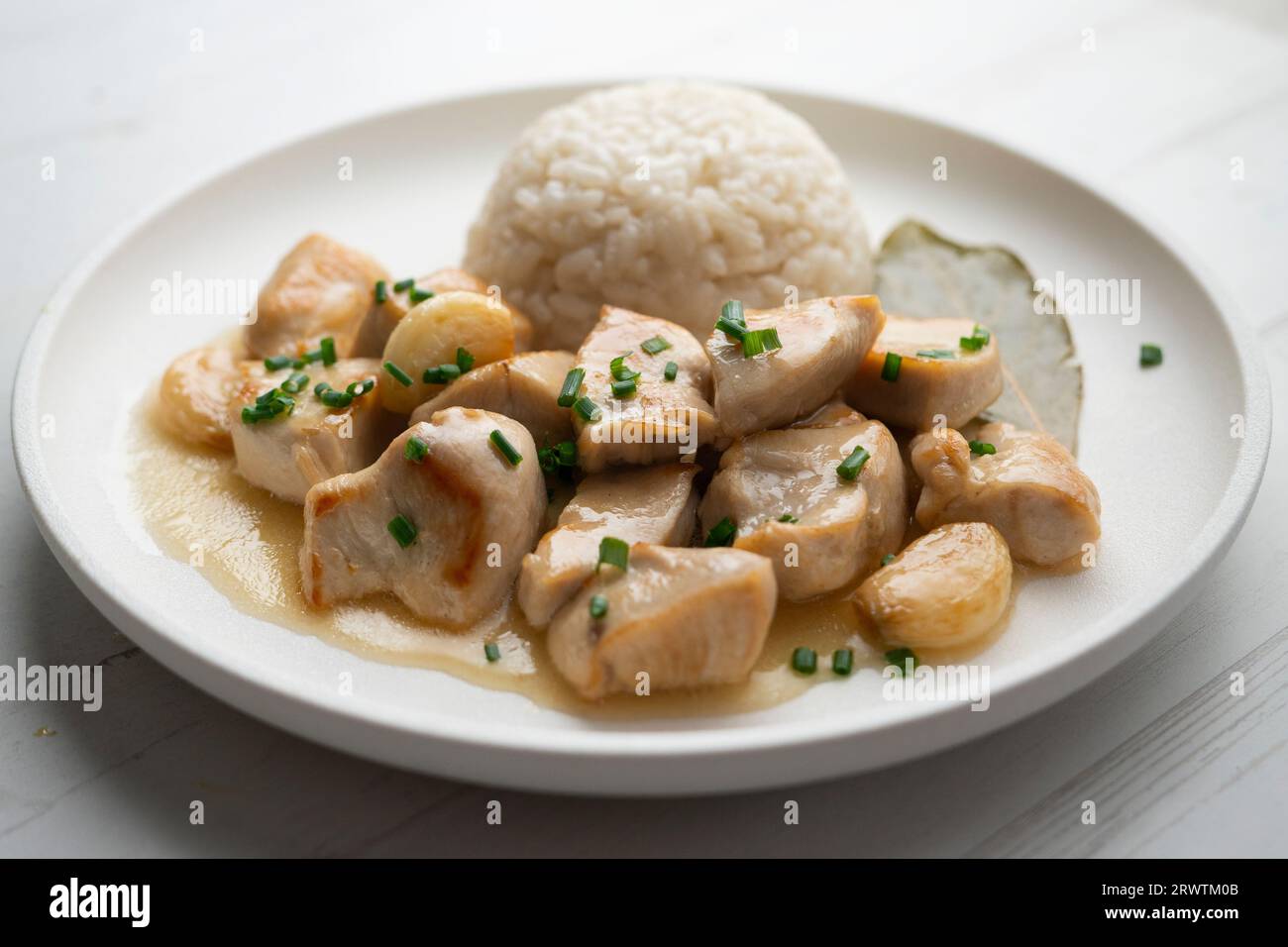 Garlic chicken. Chicken tapa cooked with garlic sauce and served with ...