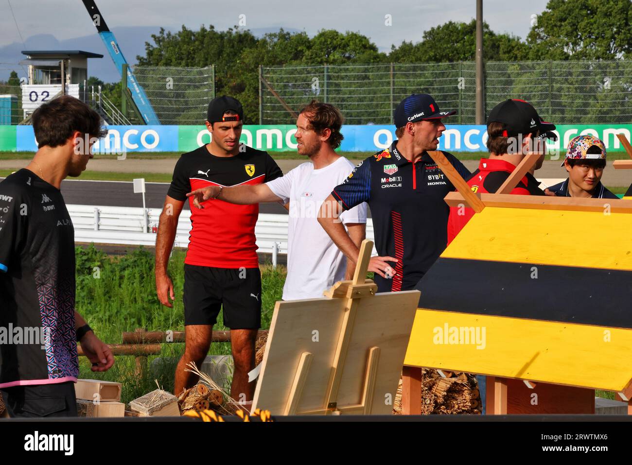 Suzuka, Japan. 21st Sep, 2023. Sebastian Vettel (GER) with Carlos Sainz ...
