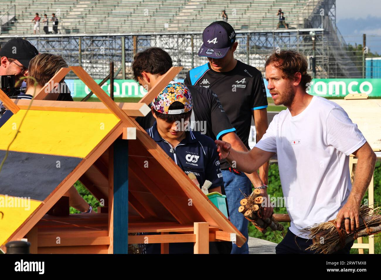 Suzuka, Japan. 21st Sep, 2023. Sebastian Vettel (GER) with Yuki Tsunoda ...