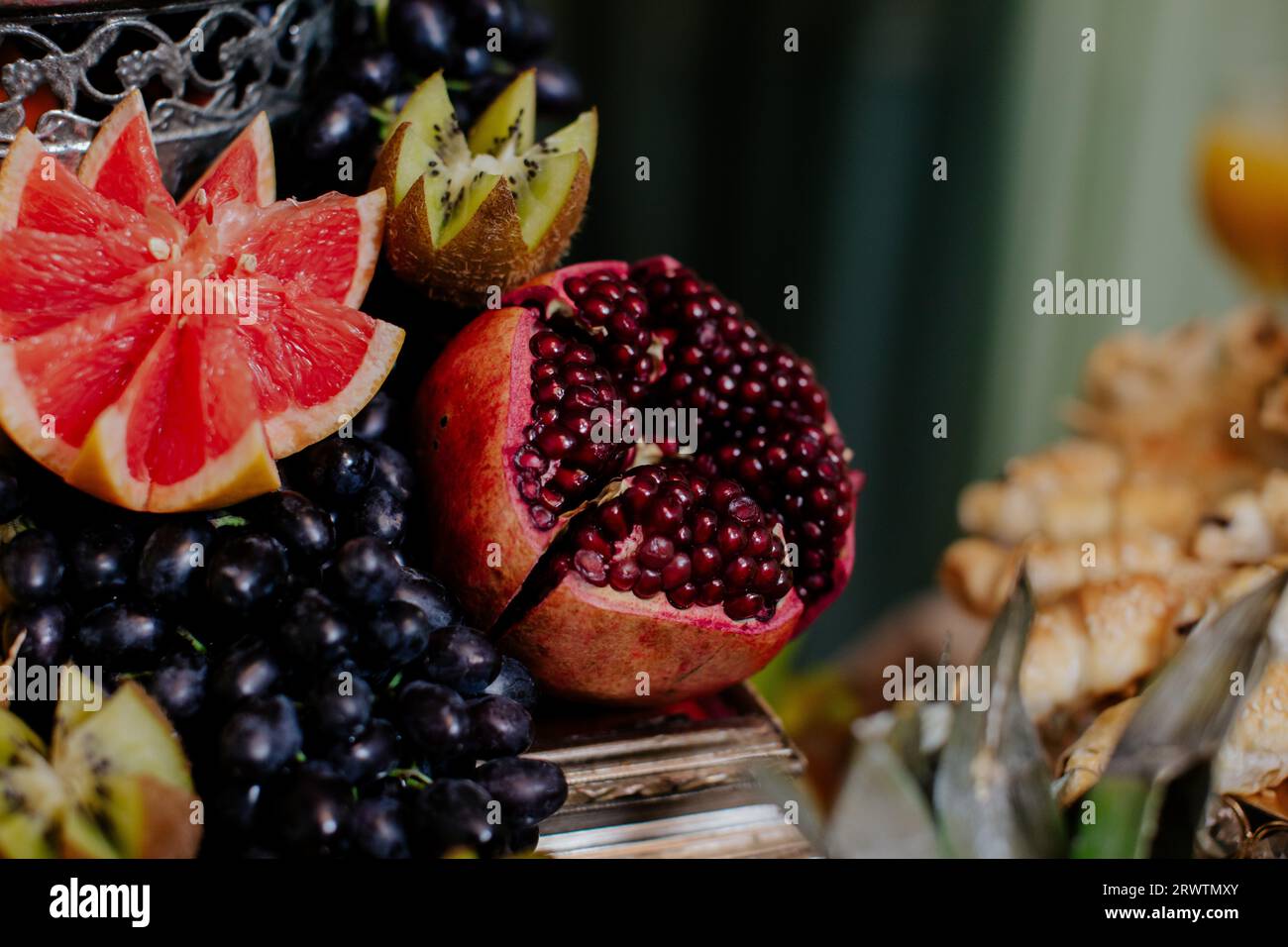 A variety of fresh fruits arranged neatly on a tabletop Stock Photo - Alamy