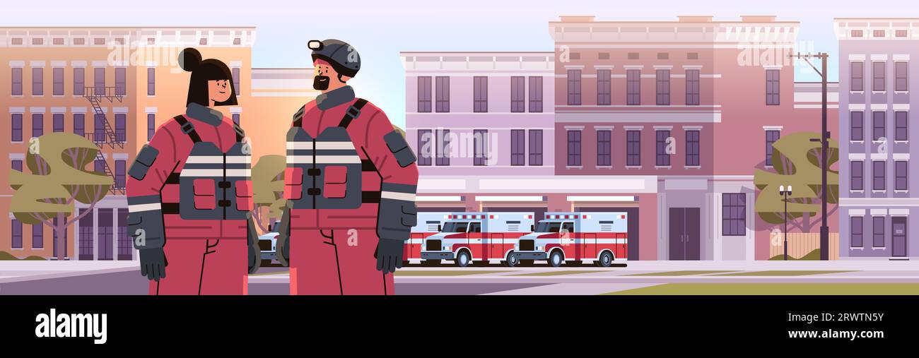 firefighters in uniform standing near fire station building department ...