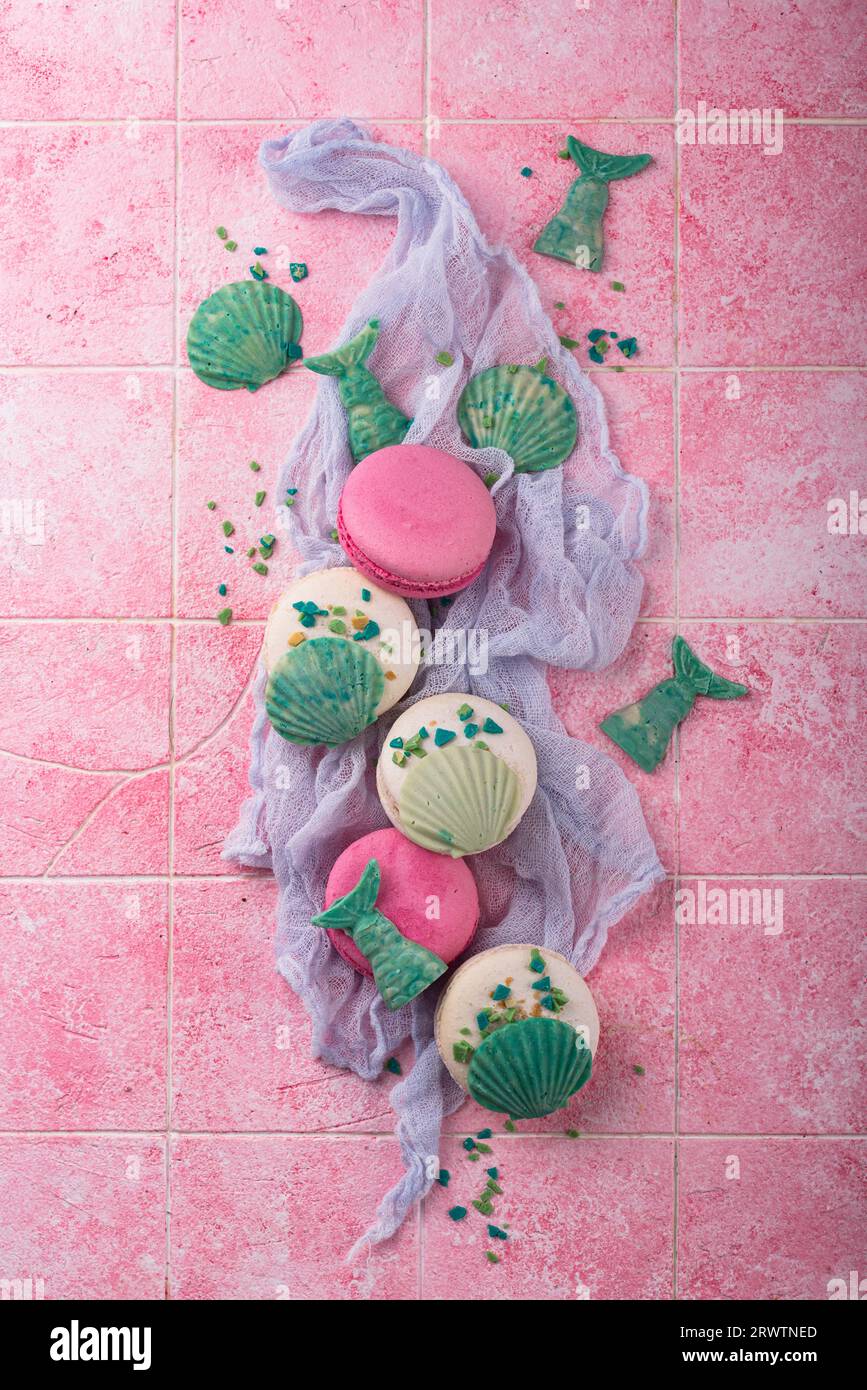 Macaroon with chocolate shell and mermaid tail Stock Photo - Alamy