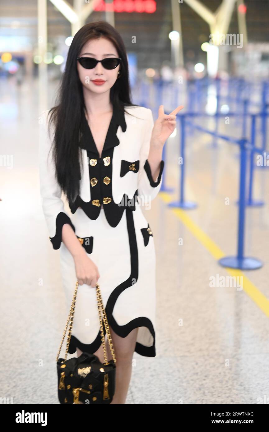 Chinese actress and singer Yu Shuxin appears at the airport in Shanghai ...