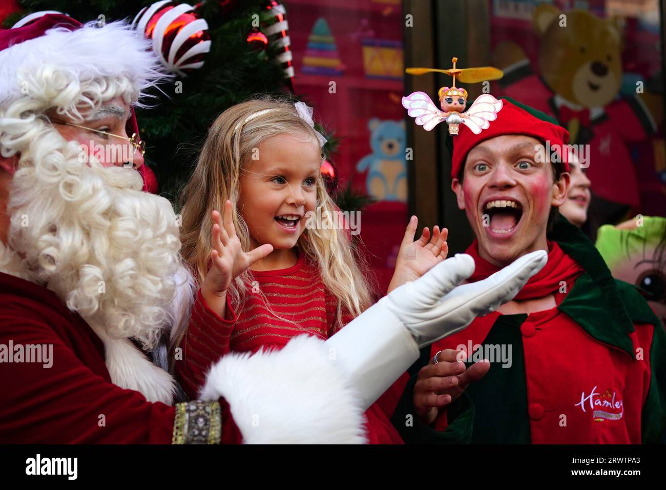 Children meet Santa and an elf at the Hamleys' Christmas Showcase 2023 ...
