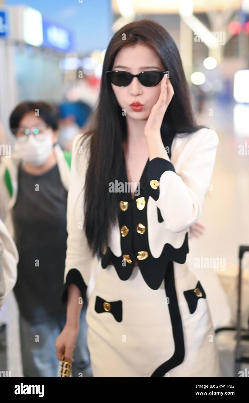 Chinese actress and singer Yu Shuxin appears at the airport in Shanghai ...