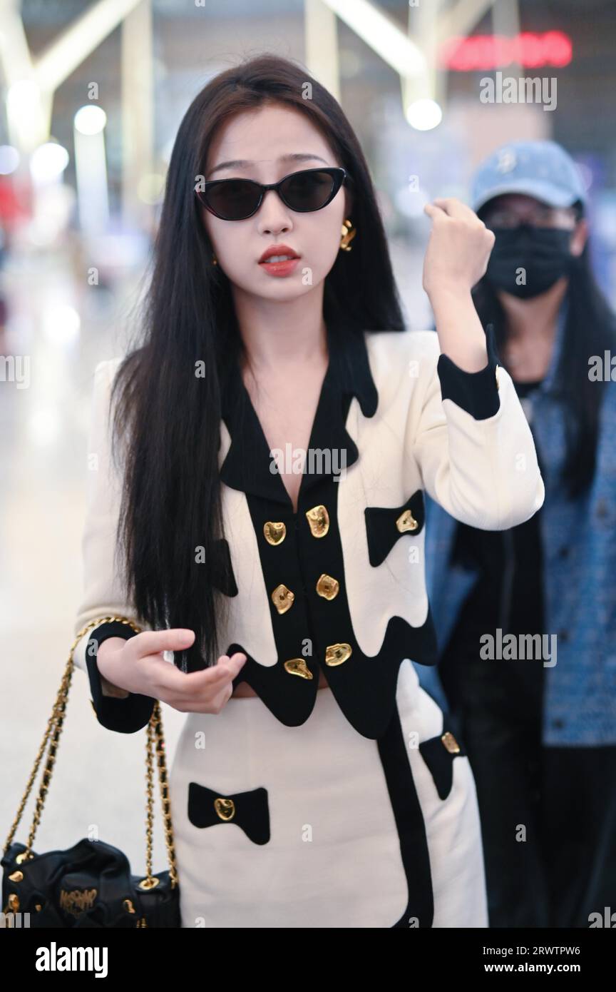 Chinese actress and singer Yu Shuxin appears at the airport in Shanghai ...