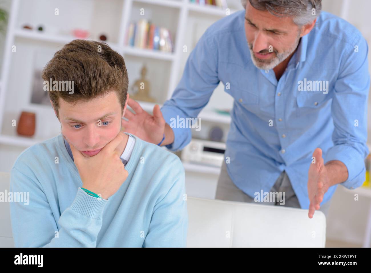a father reprimanding adolescent son Stock Photo - Alamy