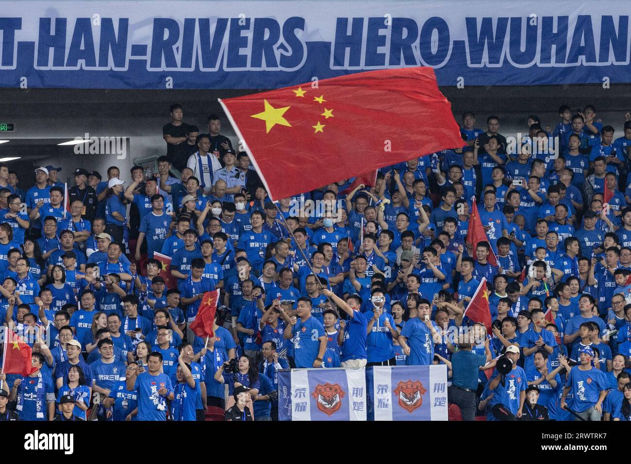 Wuhan, China. 20th Sep, 2023. Fans waves Chinese national flag during ...