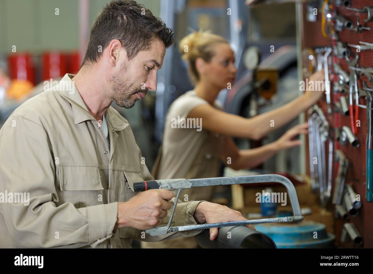Male cuts pipe hi-res stock photography and images - Alamy