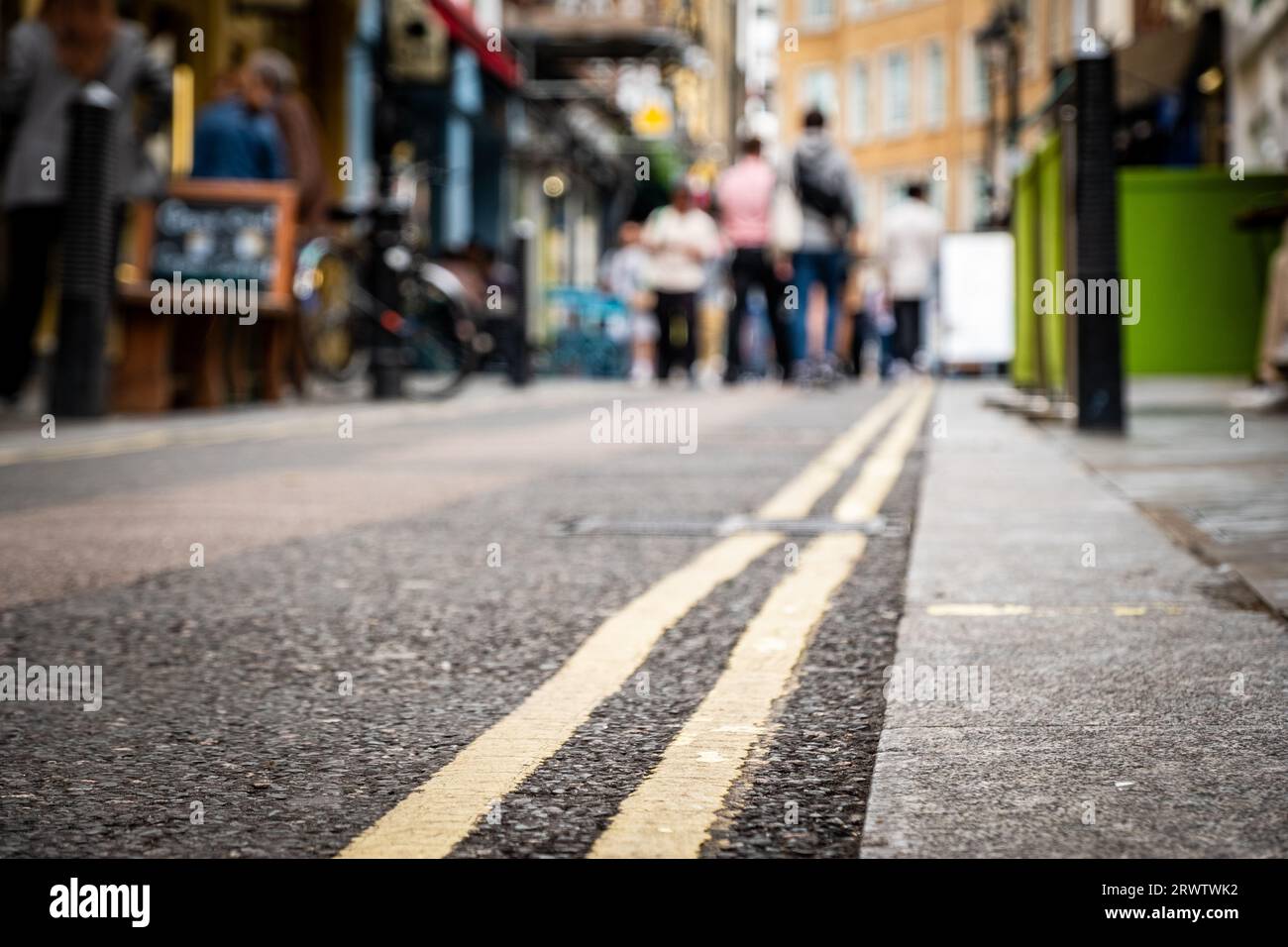 Crowds of shoppers on busy city shopping street Stock Photo - Alamy