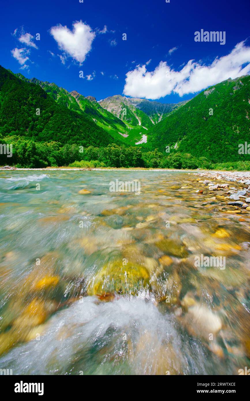 The clear stream of Azusa River, the Hotaka mountain range and heart ...