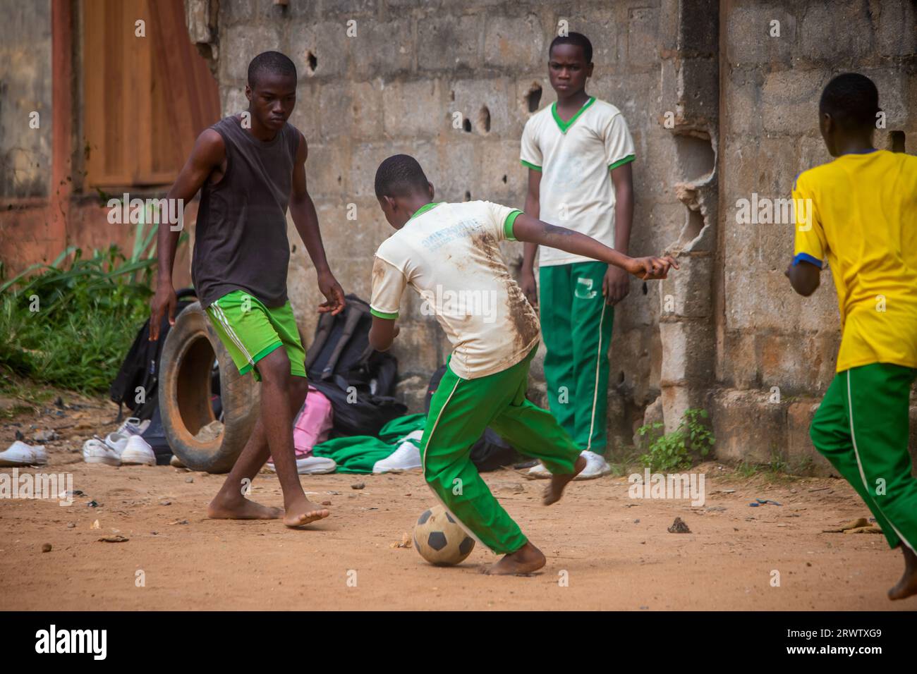 LAGOS, NIGERIA - SEPTEMBER 15: School boys playing soccer at Ansarudeen field Okota on September ...