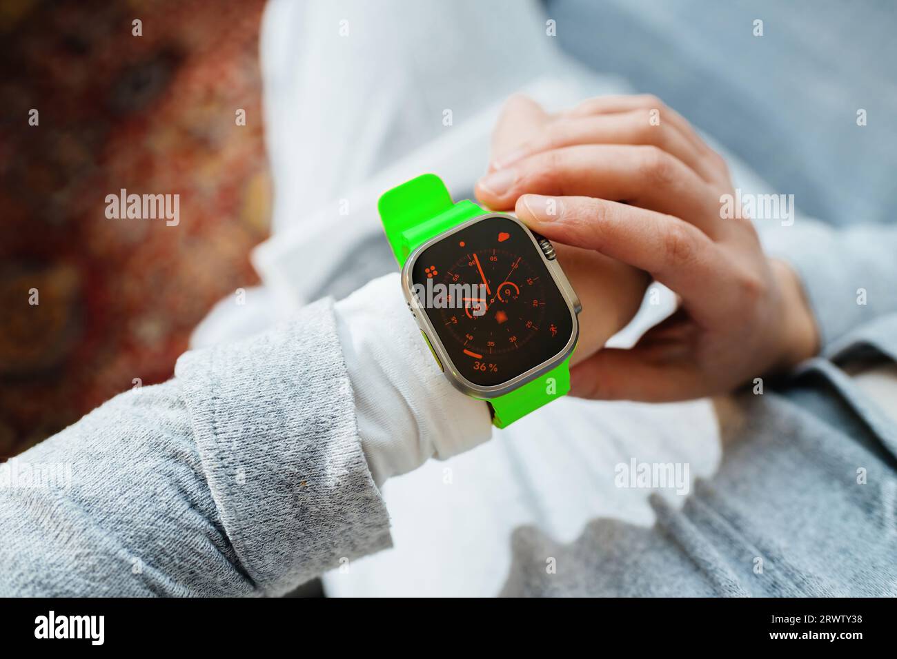 London, United Kingdom - Sep 20, 2023: A woman examines the new digital ...