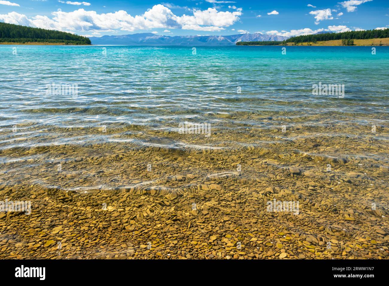 Pebble bottom seen through the crystal-clear water of Khuvsgul Lake ...